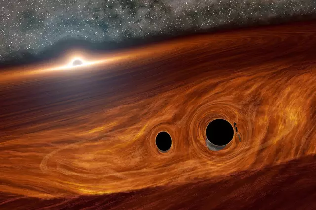 Astronomers have recorded a flash of light from the merging of black holes