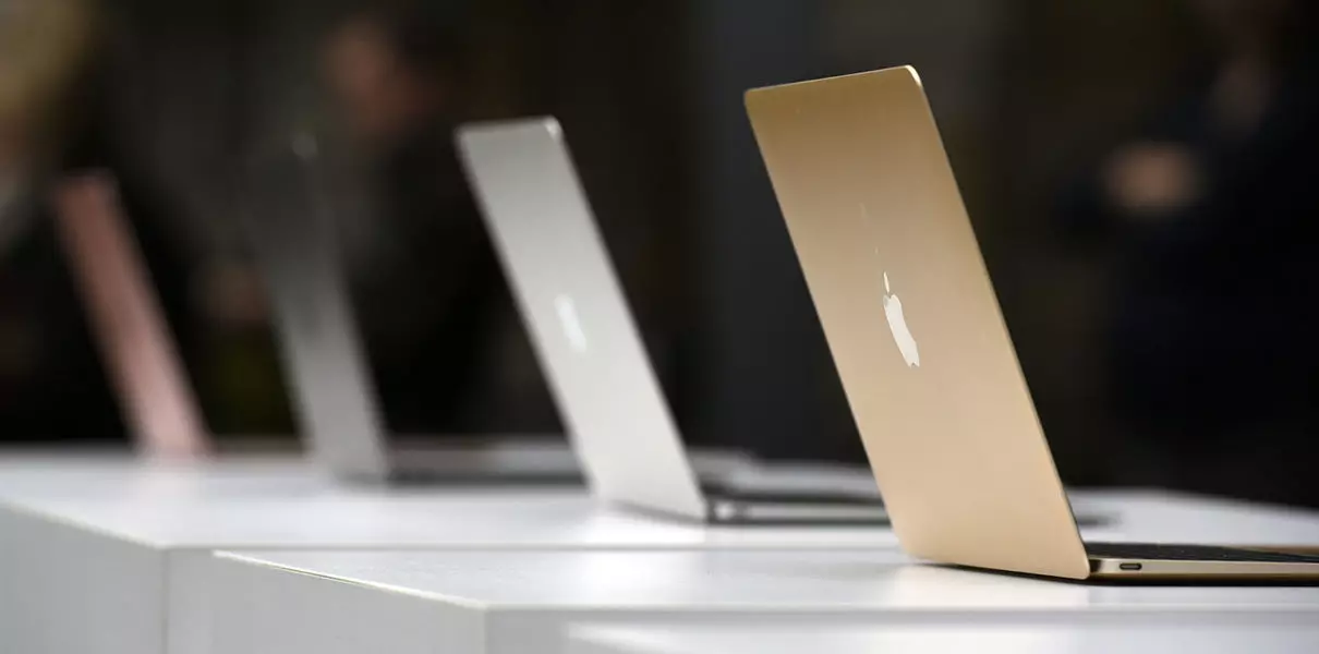 Patente sa laptop sa Apple: gipulihan sa trackpad ang iPhone, gipulihan sa iPad ang screen